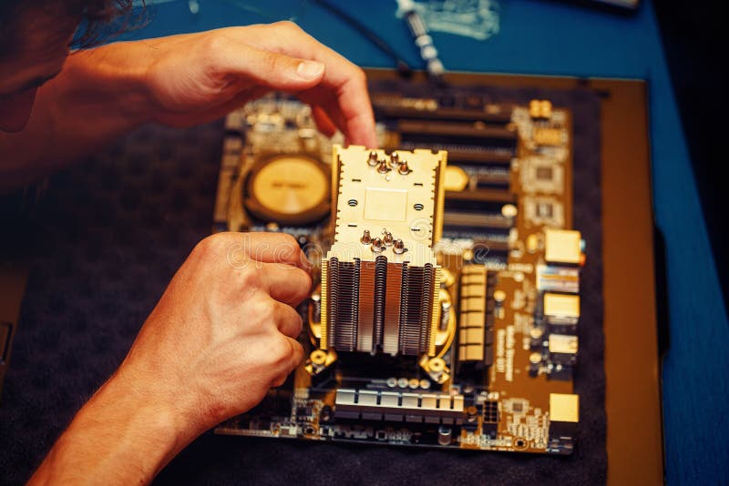 Repairman Repairs the Computer, Removing the Computer Motherboard Stock ...