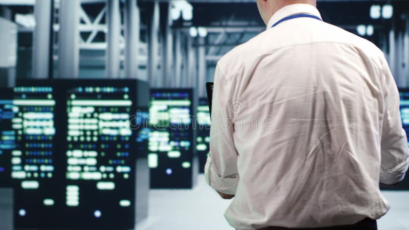 Repairman Running Code in Data Center Stock Video - Video of software ...