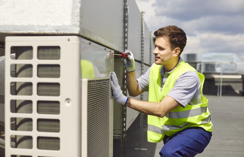 Repairman Fixing Hvac System on Roof Stock Image - Image of technician ...