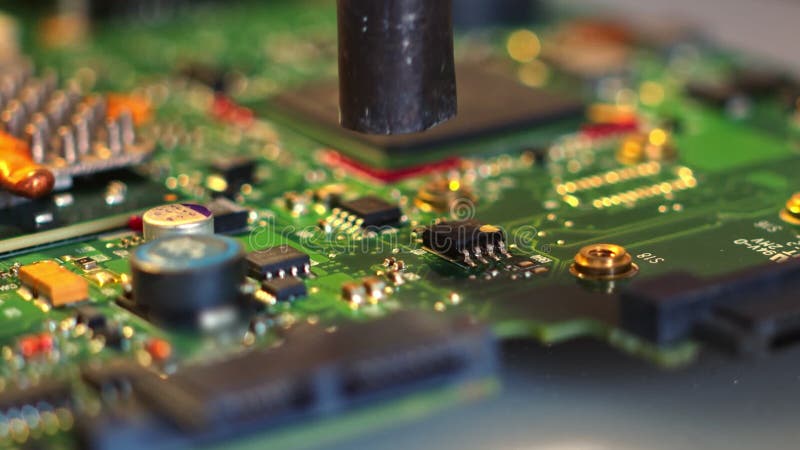 The Repairman Warms the Chip with a Burner in a Circular Motion ...