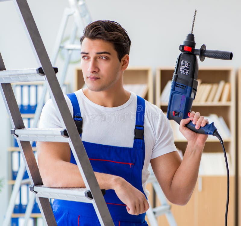 Repairman Working with Drilling Drill Perforator Stock Photo - Image of ...