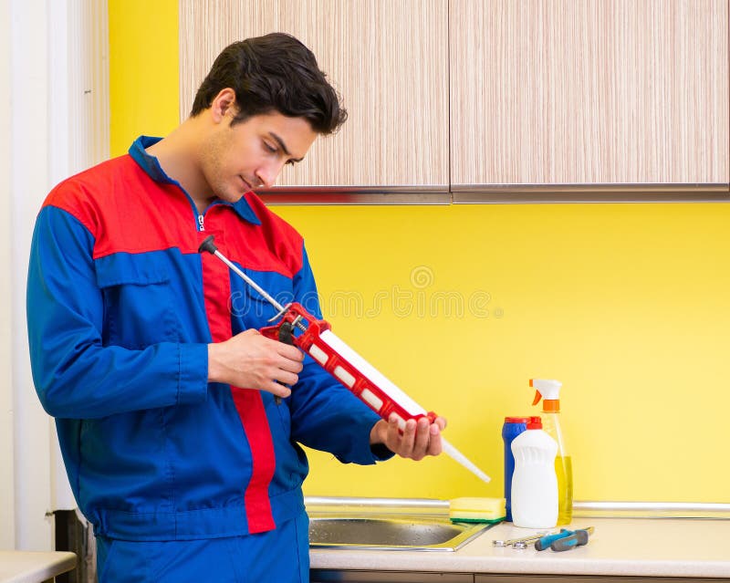 Repairman Working in the Kitchen Stock Photo - Image of assembling ...