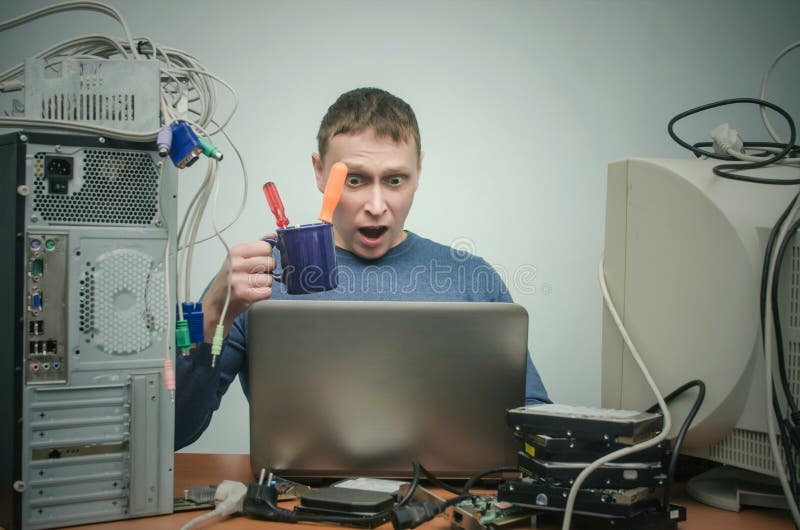 Repairman Working on Laptop Computer. Stock Image - Image of amazed ...