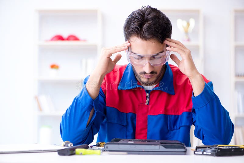 Repairman Working in Technical Support Fixing Computer Laptop Tr Stock ...
