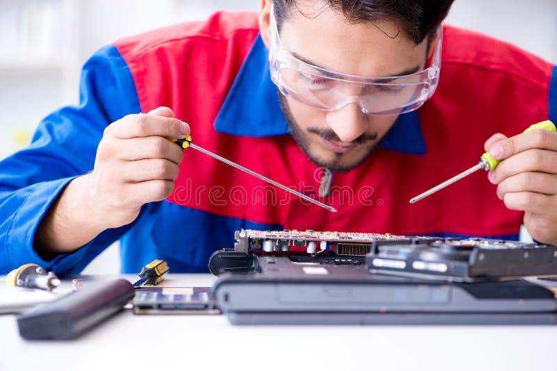 Repairman Working in Technical Support Fixing Computer Laptop Tr Stock ... Repairman Working in Technical Support Fixing Computer Laptop Tr Stock ...