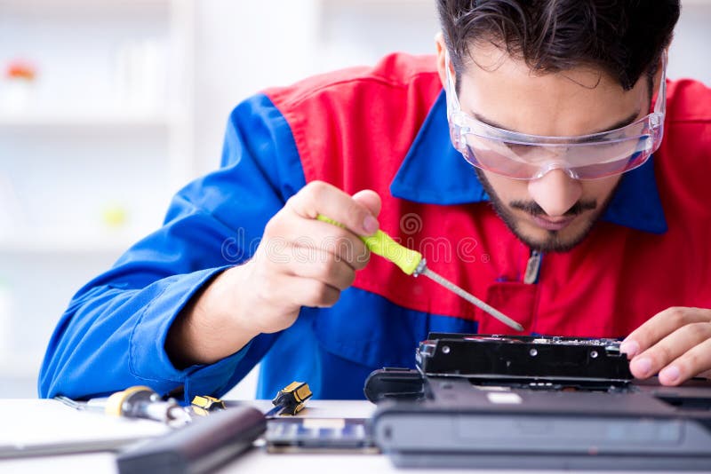 Repairman Working in Technical Support Fixing Computer Laptop Tr Stock ...
