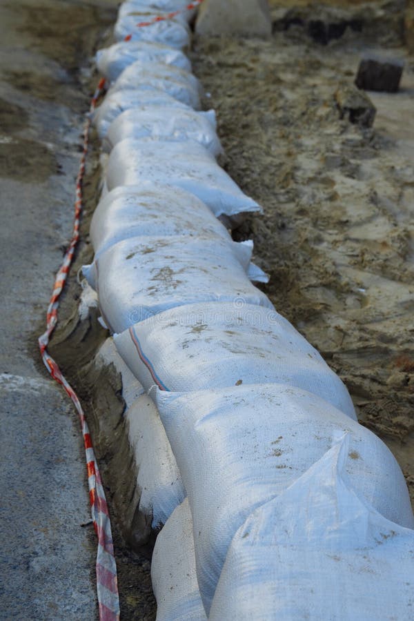 Repairs.the Wall of Sandbags. Sandbags Wall, Protection, Flood Stock ...