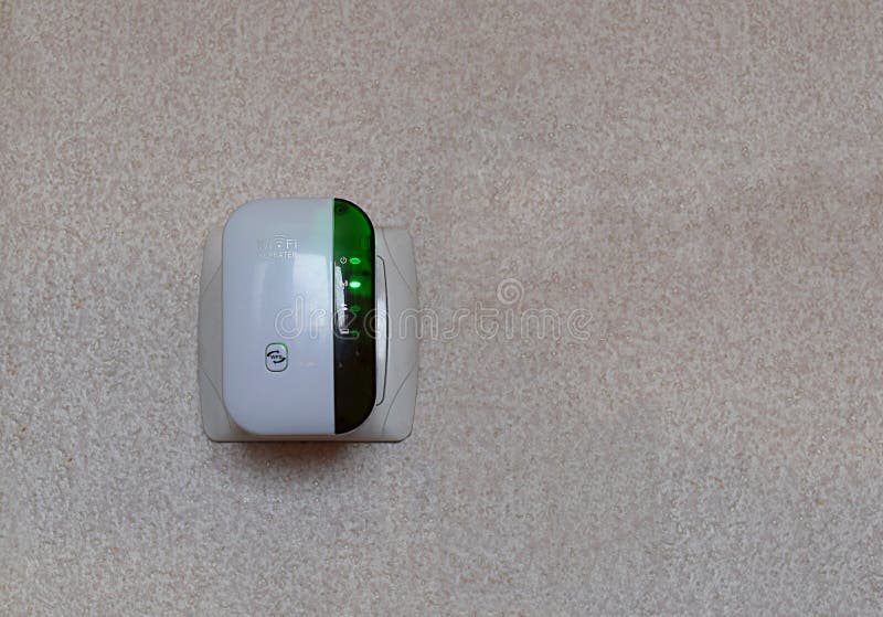 Repeater Wi-Fi Signal in an Electrical Outlet Stock Photo - Image of ...
