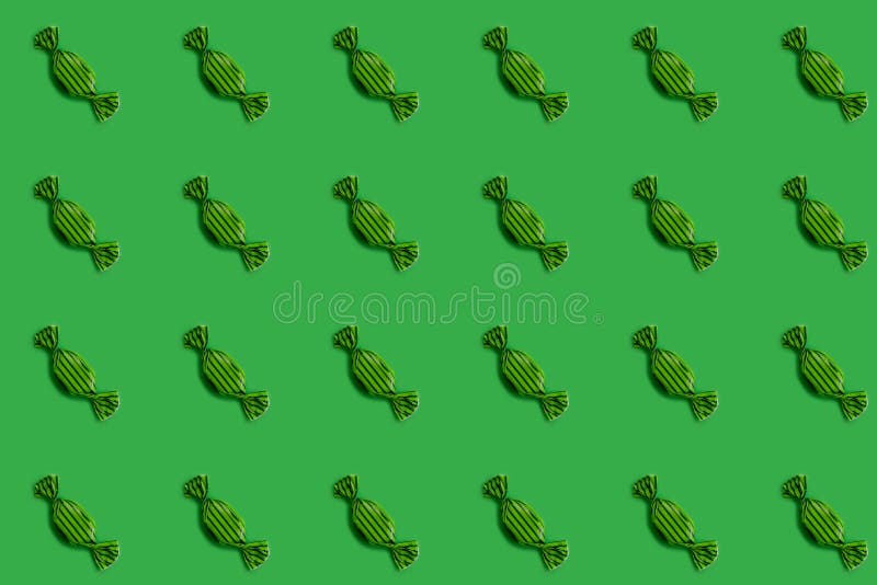 Repeating Collage of Green Candy on Green Background, Flat Lay ...