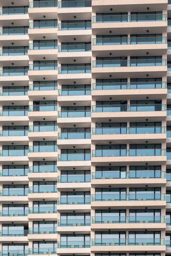 Repeating Pattern of Windows and Balcony. Bulding Front Stock Photo ...