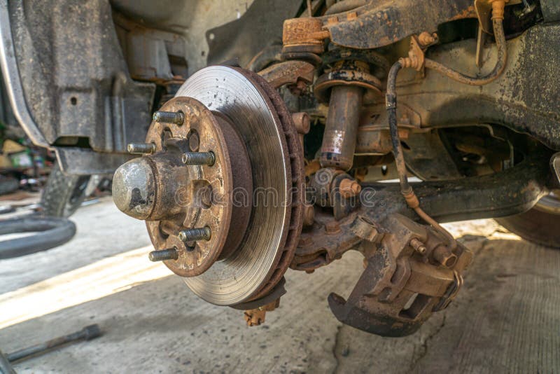 Close Up Replace Brake Disc and Pads Front Disk Brake Assembly on an ...