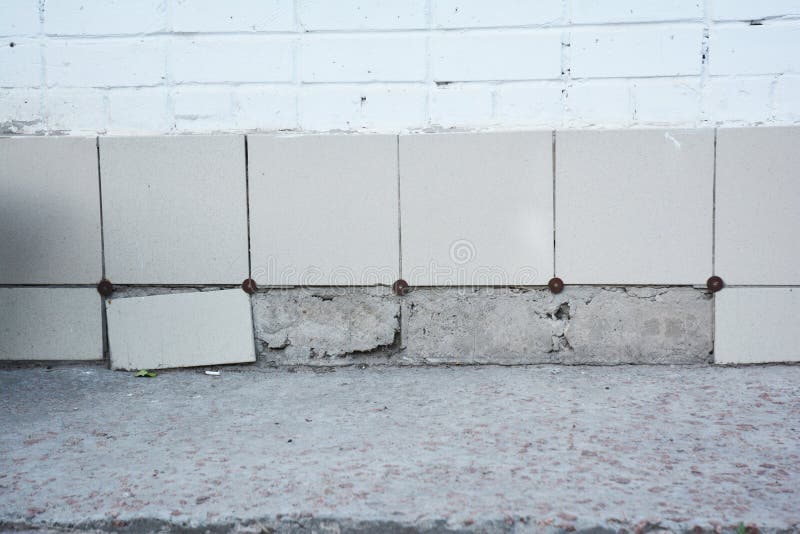 Waterproof House Foundation Coated with Tar To Protect an Old House ...