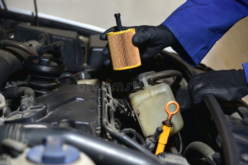 Replacement of oil filter stock photo. Image of detail - 31417612