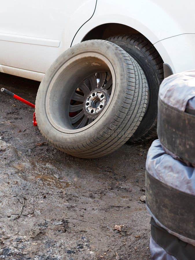 Replacement of Car Tyres - Tire Fitting Stock Photo - Image of cover ...