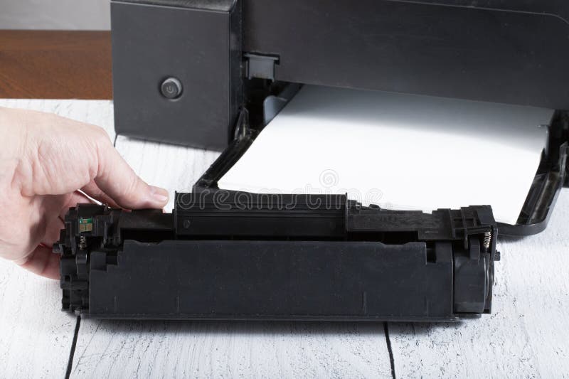 Replacement Cartridge for the Printer.Replacing the Cartridge on the ...