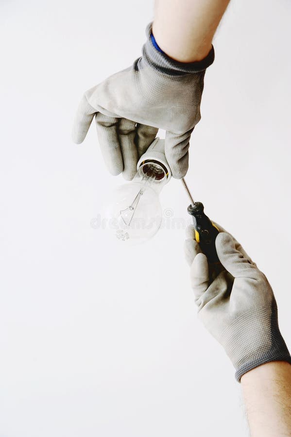 Replacement and Installation of an Light Bulb Stock Image - Image of ...