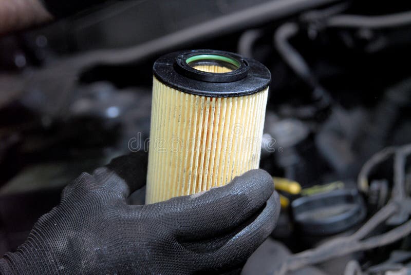 Replacement of oil filter stock photo. Image of auto - 63932930