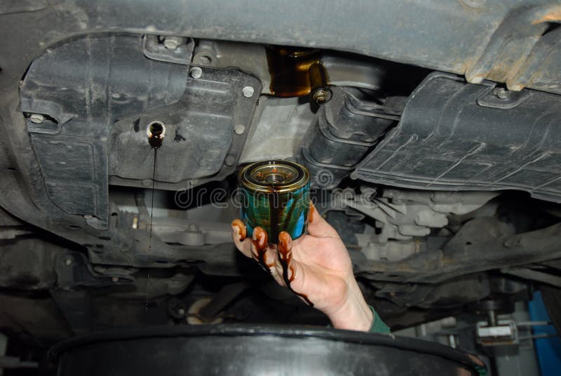 Replacement of oil filter stock photo. Image of detail - 31417612