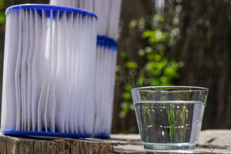 The Replacement Pool Filter Cartridges. Glass of Pure Water Stock Photo ...