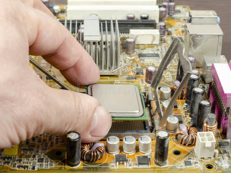 Replacement of the Processor on the Motherboard Close-up Stock Image ...