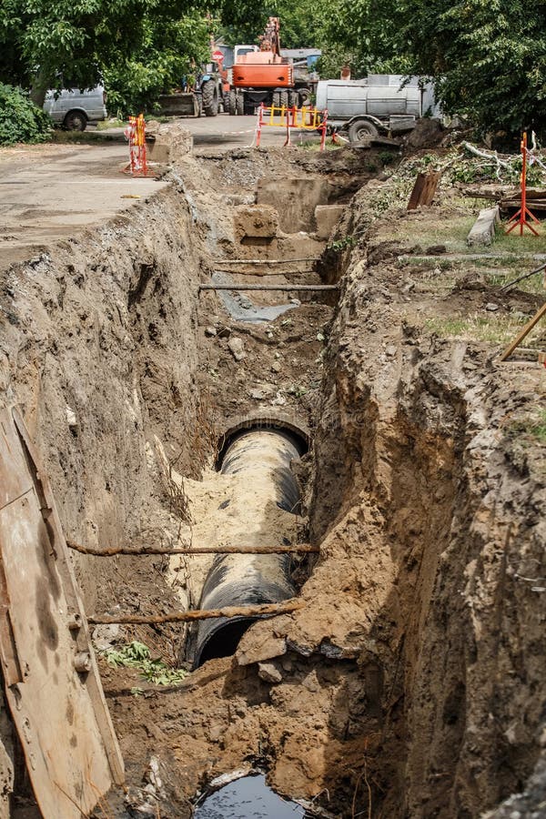 Replacement of a Sewer Pipe Deep Under the Ground Stock Image - Image ...