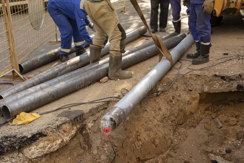 Replacement of Sewer Pipes. Laying Gas Pipes in the Ground Stock Image ...