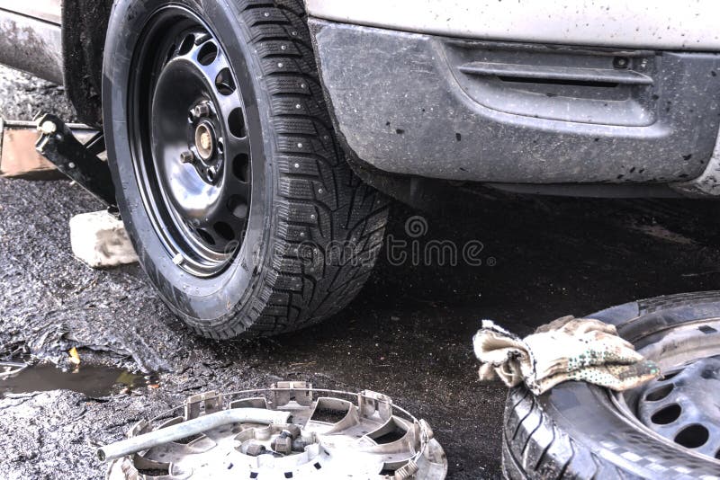 Replacement Wheels on the Car Stock Photo - Image of breakdown, autocar ...
