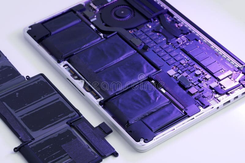 Replacing a Broken Battery in a Laptop. Stock Image - Image of light ...