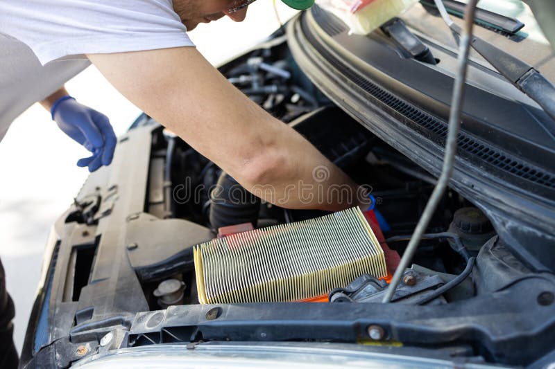 Replacing the Car S Air Filter with a New One, Mechanic Replace a New ...
