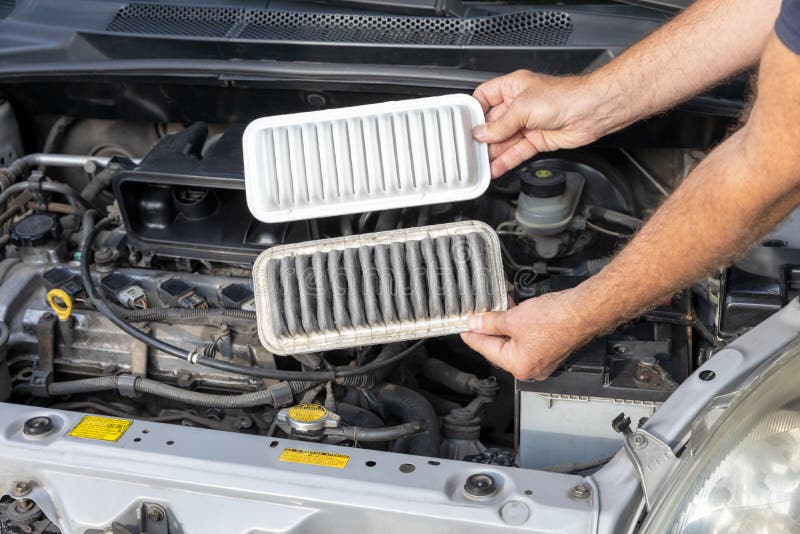 Replacing the Dirty Engine Air Filter for a Car Stock Image - Image of ...
