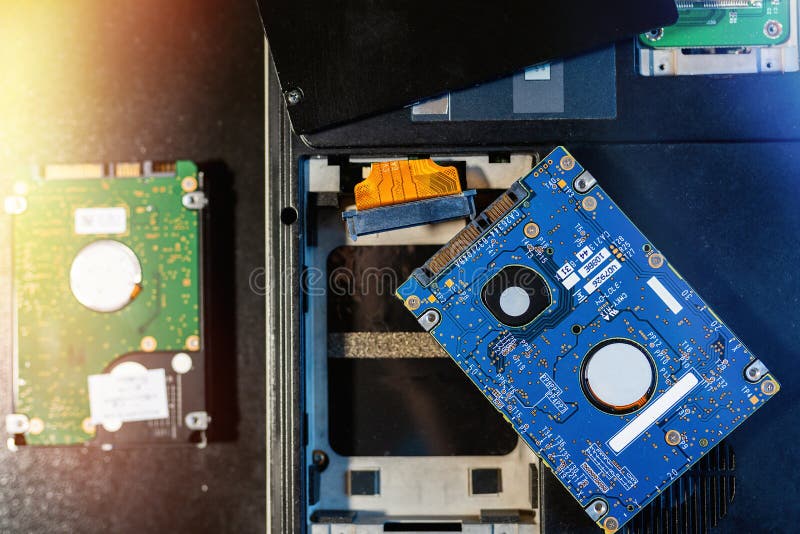 Replacing or Installing Hdd on an Old Laptop, on a Black Background ...