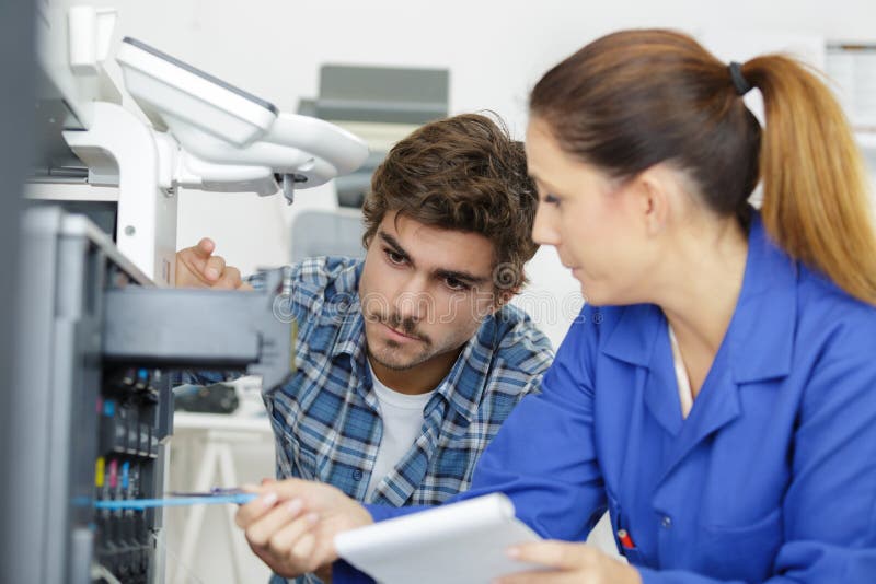 Replacing the Machine Mechanism Stock Photo - Image of electrician ...
