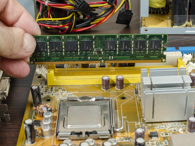 Replacing the Memory Strip on the Motherboard of a Personal Computer ...