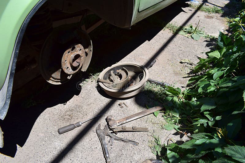 Replacing rear brake pads stock image. Image of change - 159127851