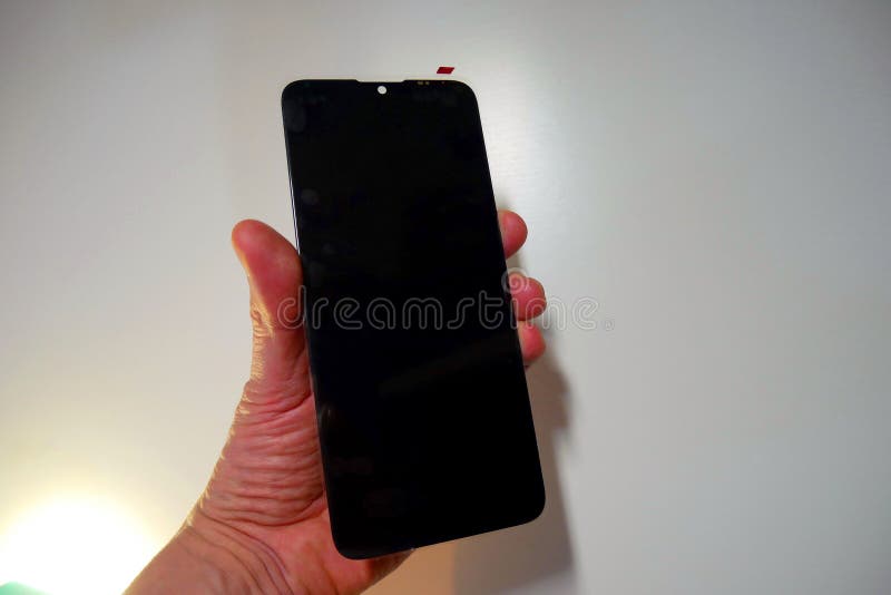 Replacing the Screen on a Mobile Phone. a Broken Smartphone Screen ...