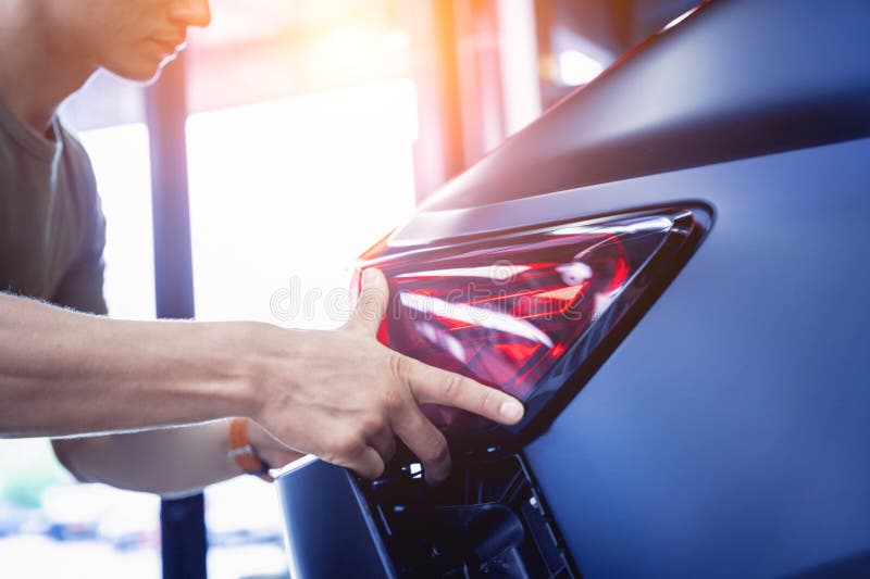 Replacing Spare Parts on a Disassembled Car in a Car Service Garage ...