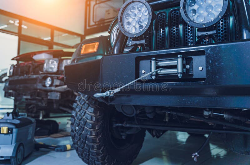 Replacing Spare Parts on a Disassembled Car in a Car Service Garage ...