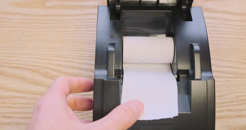 Replacing the Thermal Paper Roll in a Receipt Printer. First Person ...