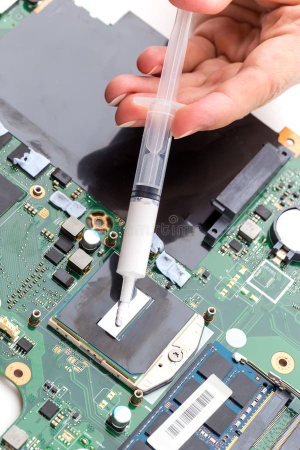 Replacing Thermal Paste on a Laptop. Stock Photo - Image of grey ...