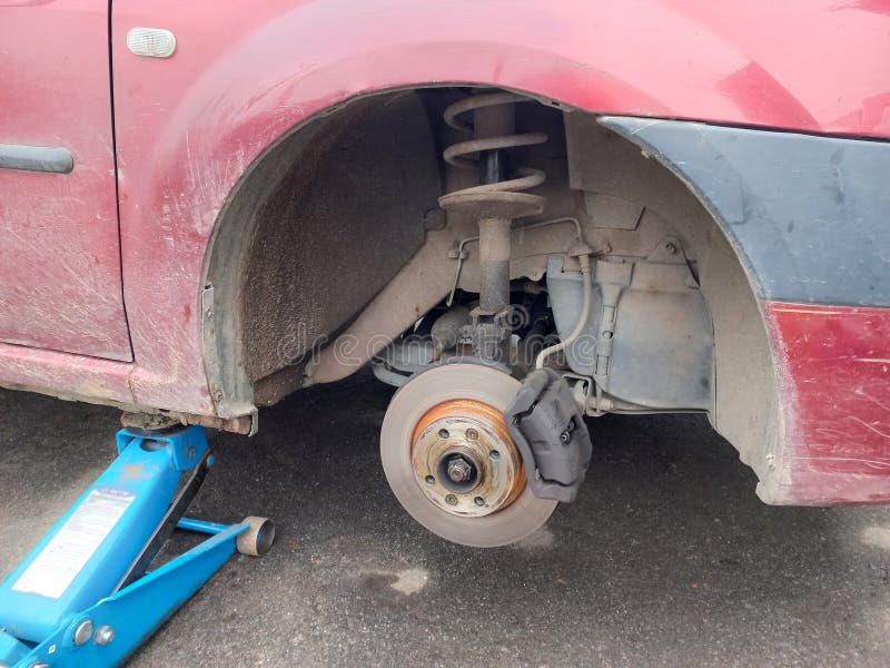 Replacing a Wheel on a Passenger Car Stock Image - Image of routine ...