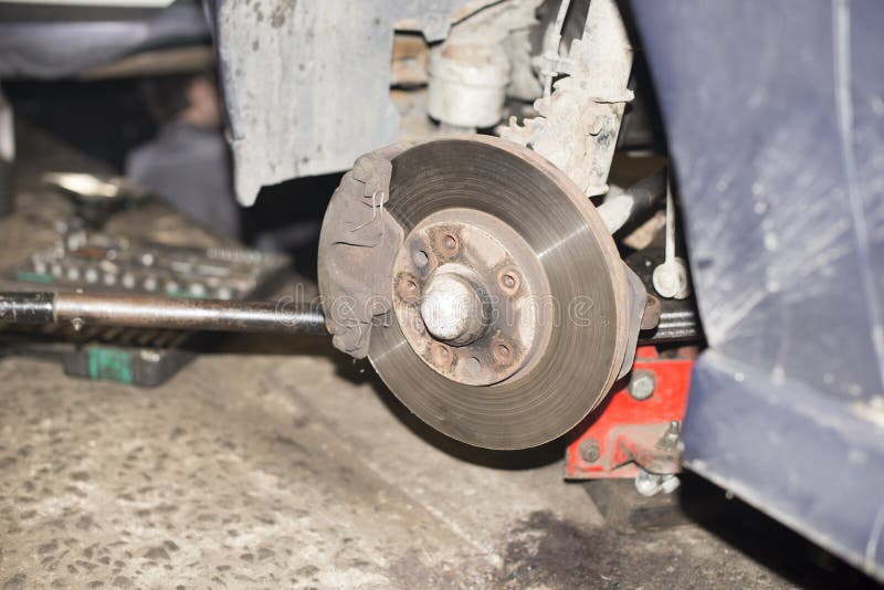 Replacing Wheels on a Car, Closeup Photo of Rotor Disk with Brake Stock ...