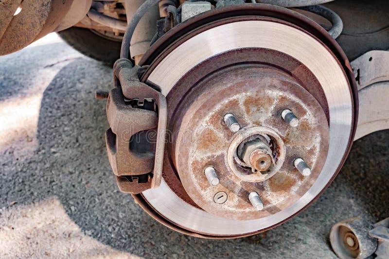 Replacing Wheels on a Car, Closeup Photo of Rotor Disk with Brake Stock ...