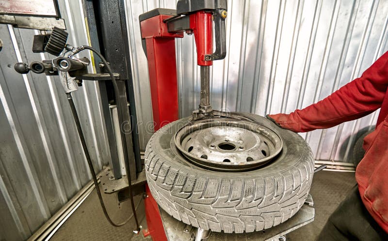 Replacing the Wheels on a Car on the Service Stock Image - Image of ...