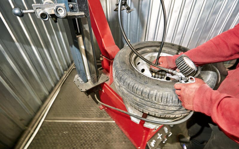 Replacing the Wheels on a Car on the Service Stock Photo - Image of ...