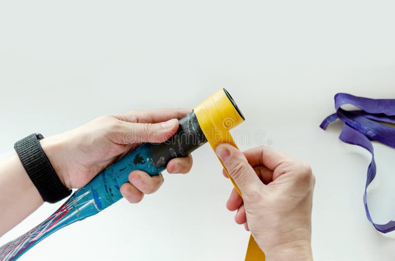 Replacing and Winding Grip Tape on a Racket Handle Stock Image - Image ...
