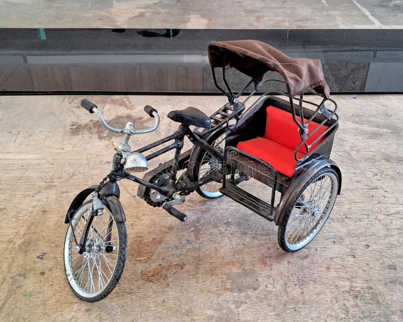 Replica tricycle rickshaw stock photo. Image of cycling - 336544470