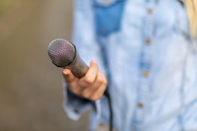 Reporter on the Spot, Holding Microphone in Hand Stock Image - Image of ...