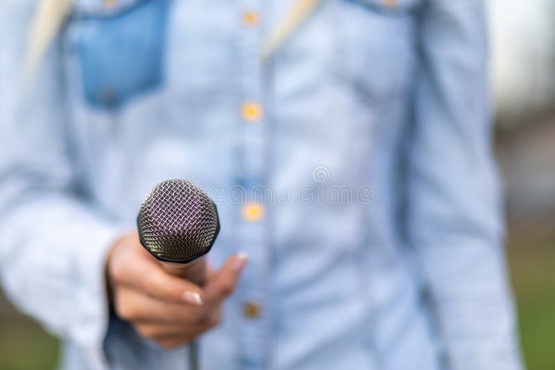 Reporter on the Spot, Holding Microphone in Hand Stock Image - Image of ...