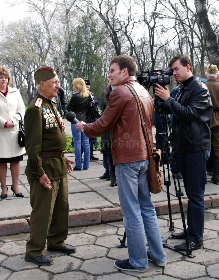 Reporters and veteran editorial stock image. Image of military - 19083279