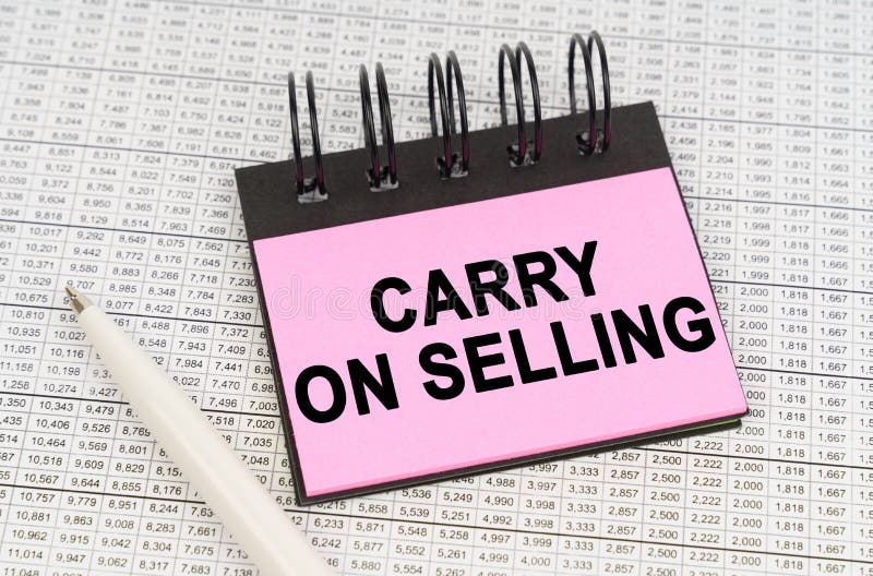 On Reporting Documents and Charts There is a Pen and a Notepad with the ...